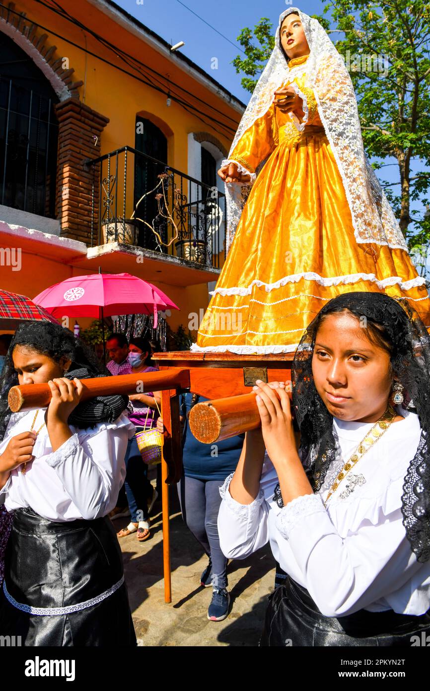 Mexican women carry the palanquin of Virgin Mary during during the Good ...
