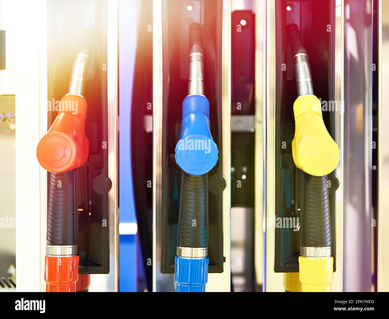 Fuel nozzles on filling station Stock Photo - Alamy