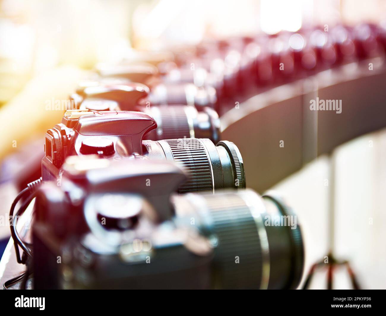SLR digital cameras in a row Stock Photo - Alamy