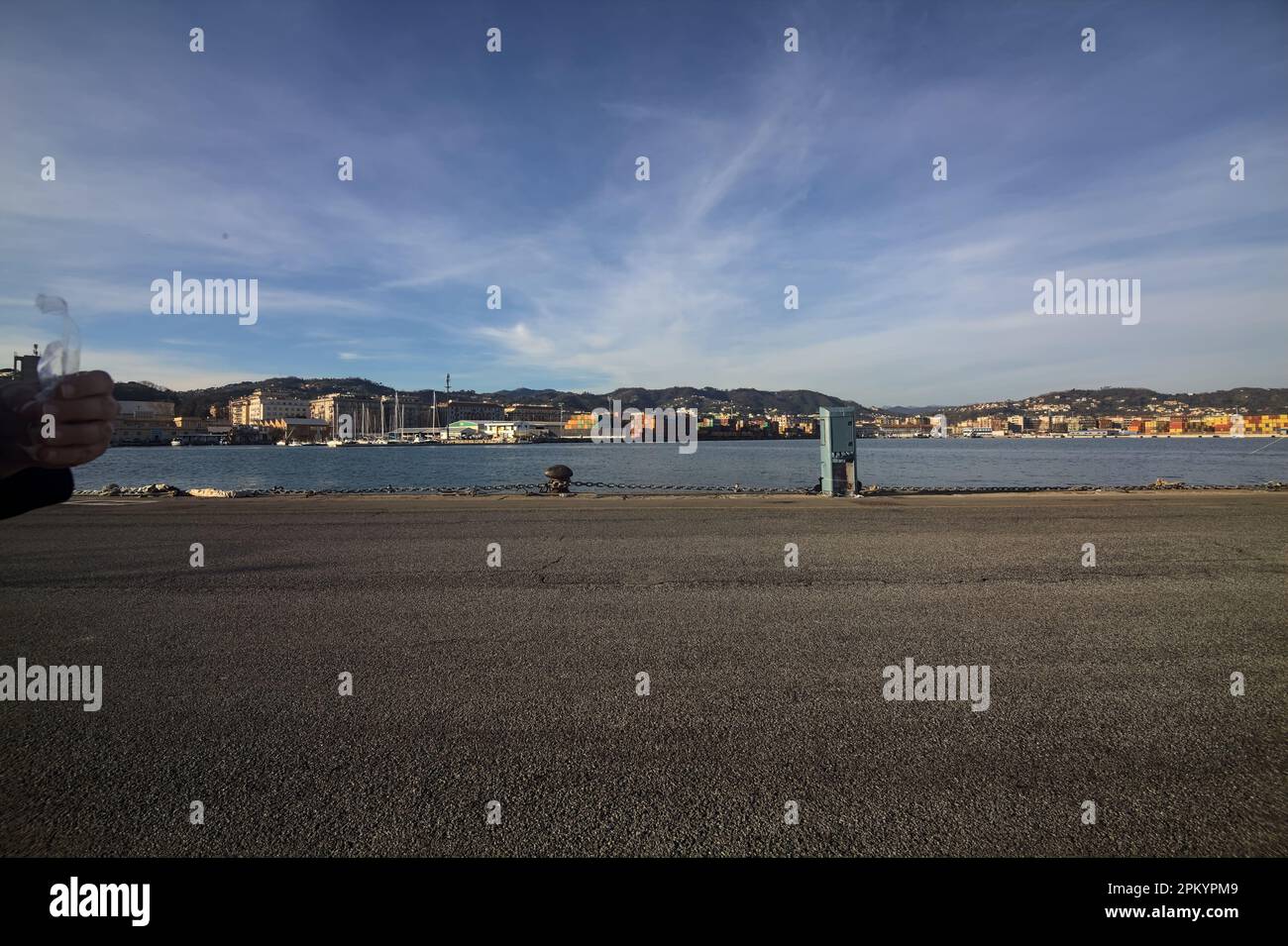 Freight yard and an industrial complex in a harbour at sunset seen from ...