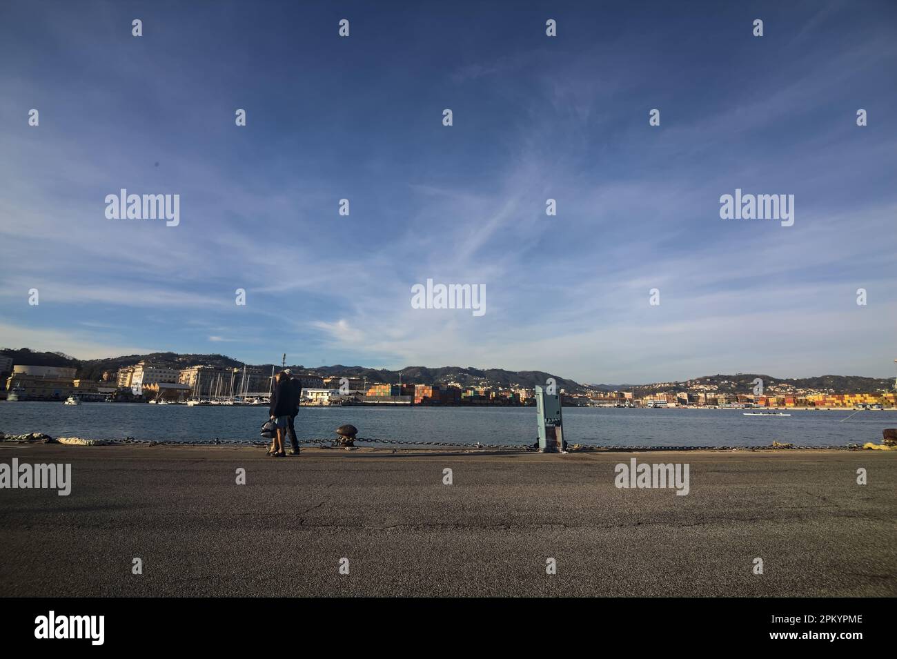 Freight yard and an industrial complex in a harbour at sunset seen from ...