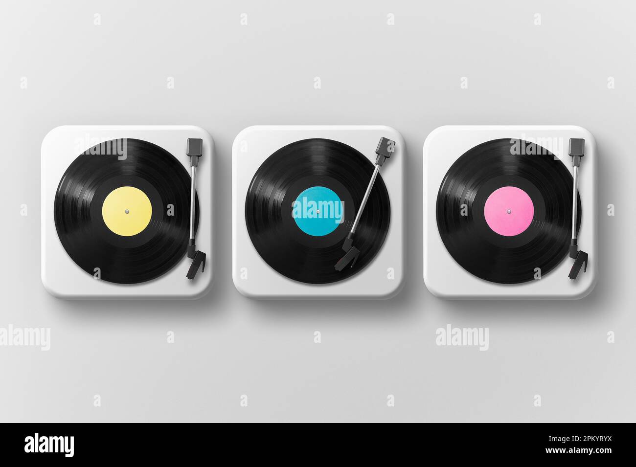 Top view of modern turntables with black colored vinyl records on white ...