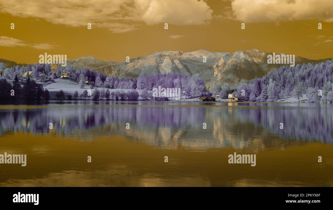 Water expanse of wonderful lake between amazing mountains and ...