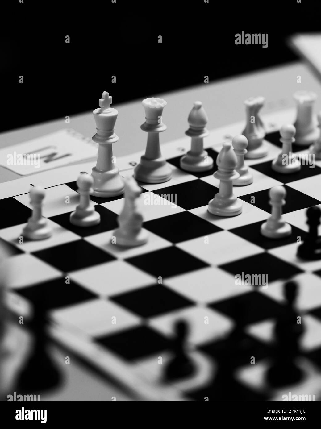A stunning black and white photograph of a traditional chessboard with ...