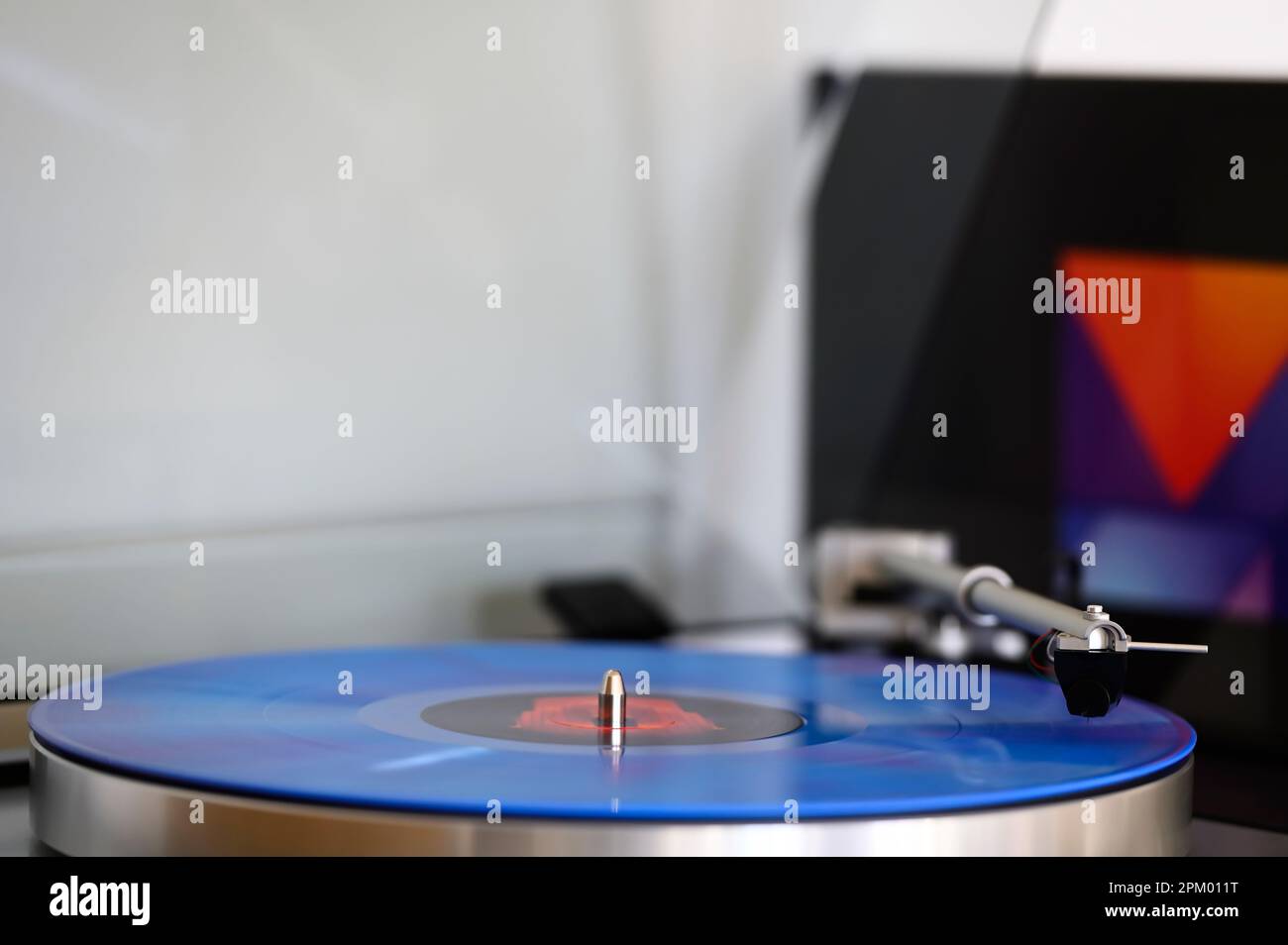Colored vinyl on the record player Stock Photo - Alamy