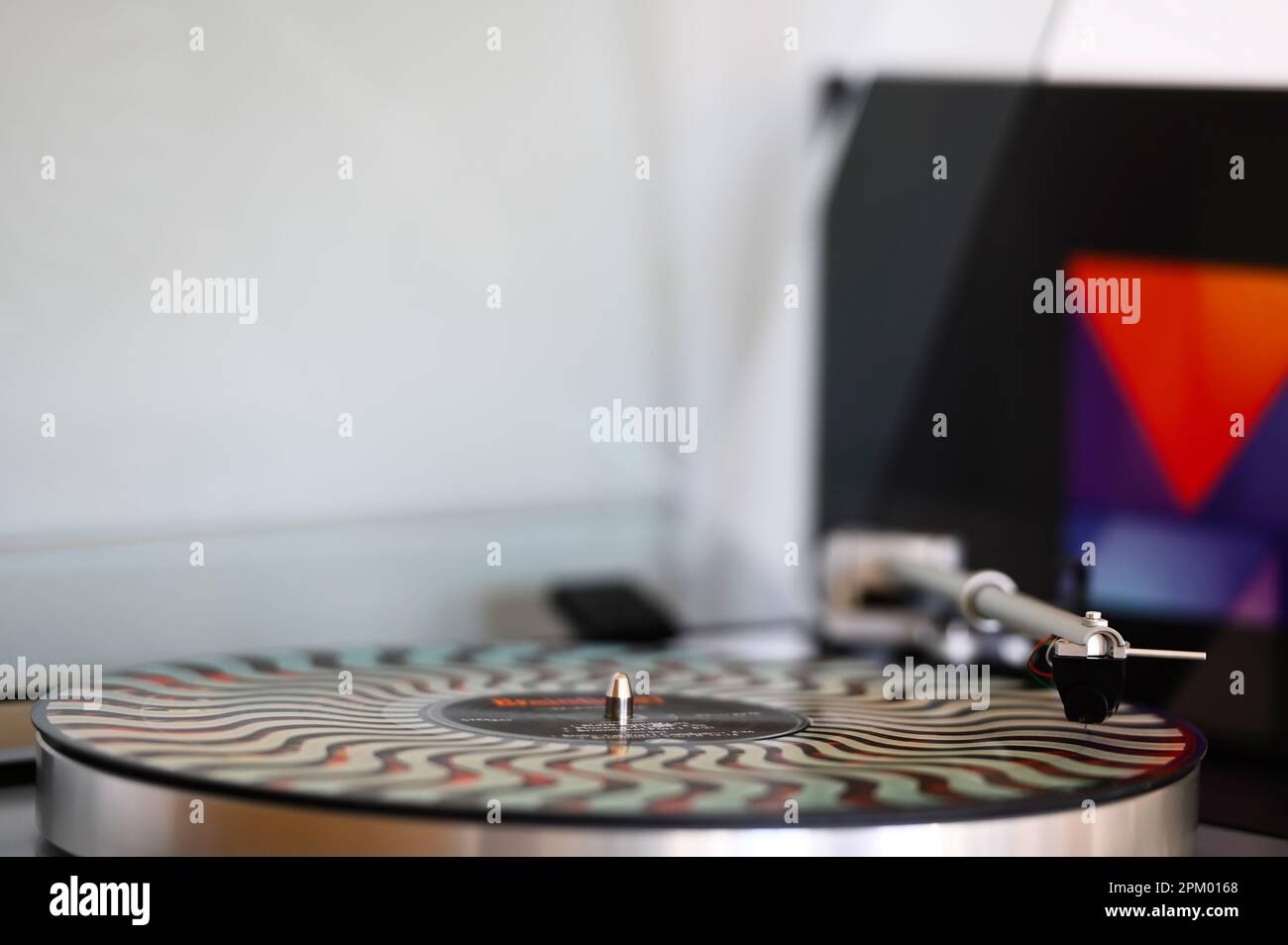 Colored vinyl on the record player Stock Photo - Alamy