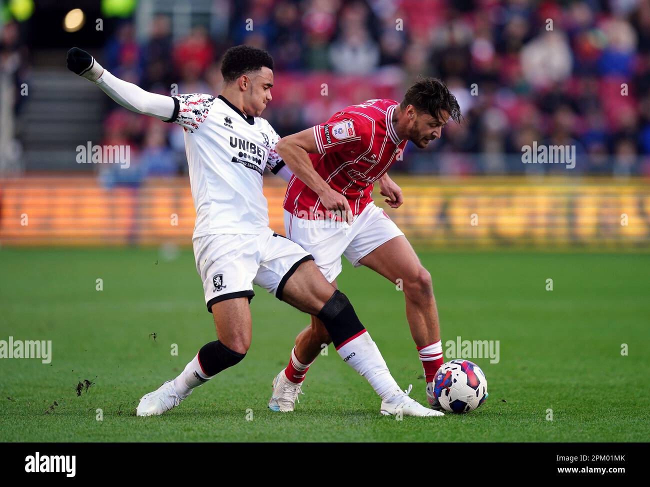 Bristol City's Harry Cornick and Middlesbrough's Aaron Ramsey battle ...