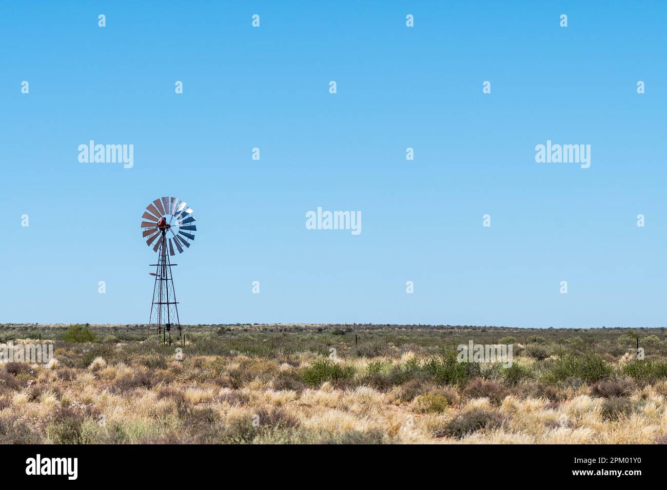 Kenhardt, South Africa - Feb 28 2023: A windmill in a Karoo landscape ...