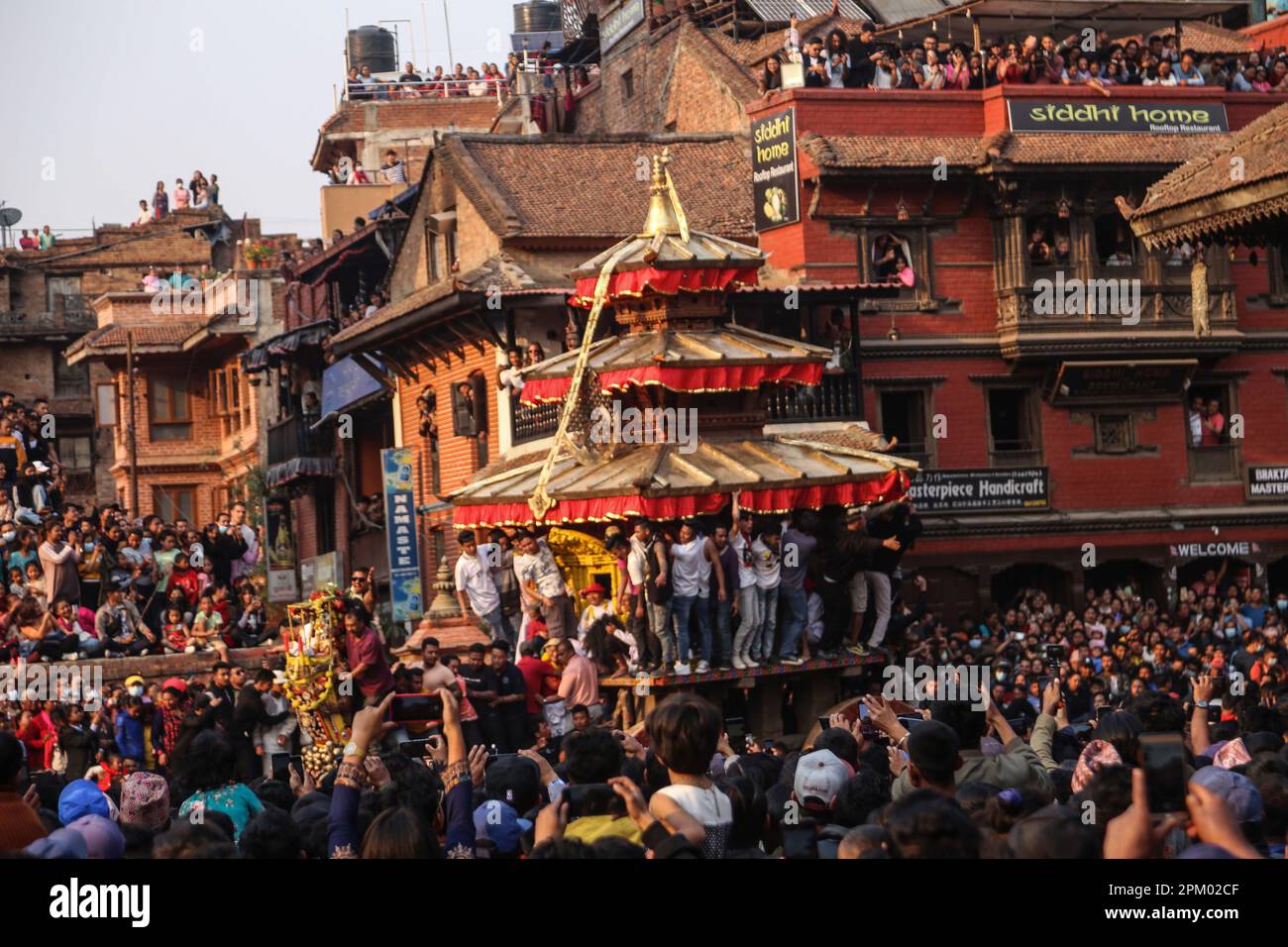 Bhaktapur, Bagmati, Nepal. 10th Apr, 2023. People pull the chariot of ...