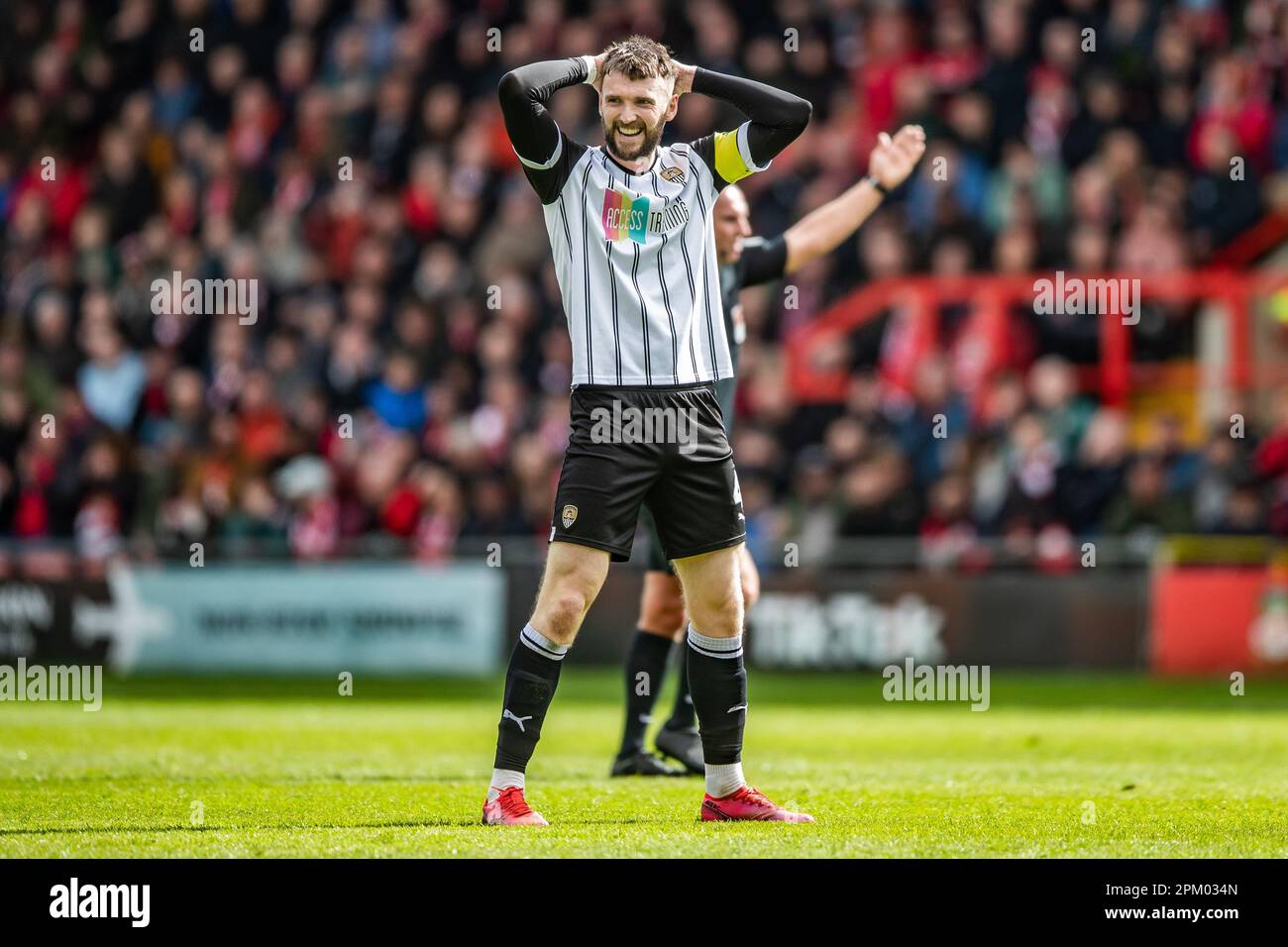 Wrexham, UK. 10th Apr, 2023. Kyle Cameron #4 of Notts Countyholds his ...