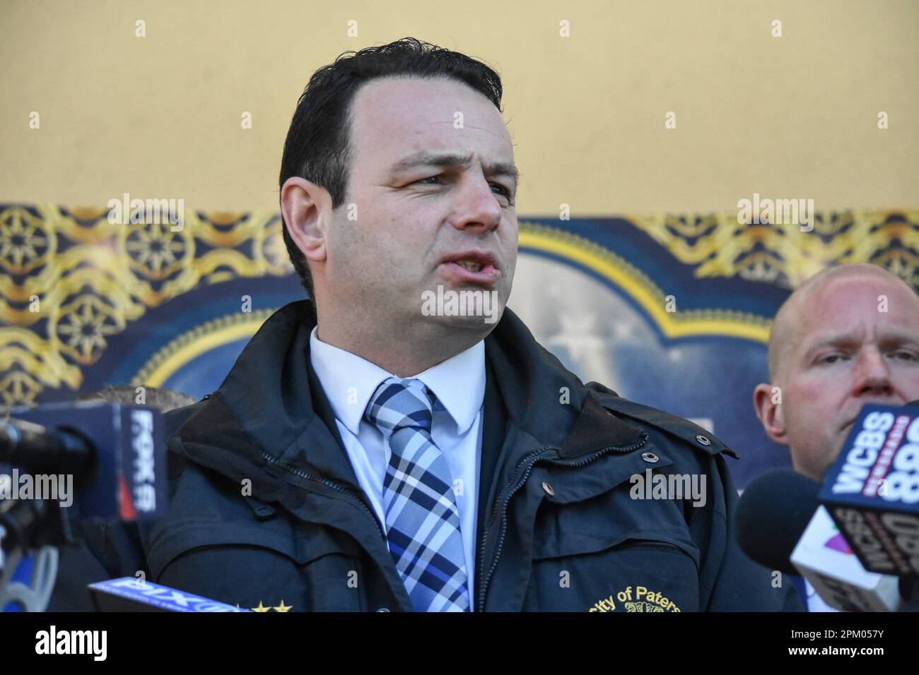 Mayor of Paterson Andre Sayegh delivers his remarks. Mayor of Paterson ...