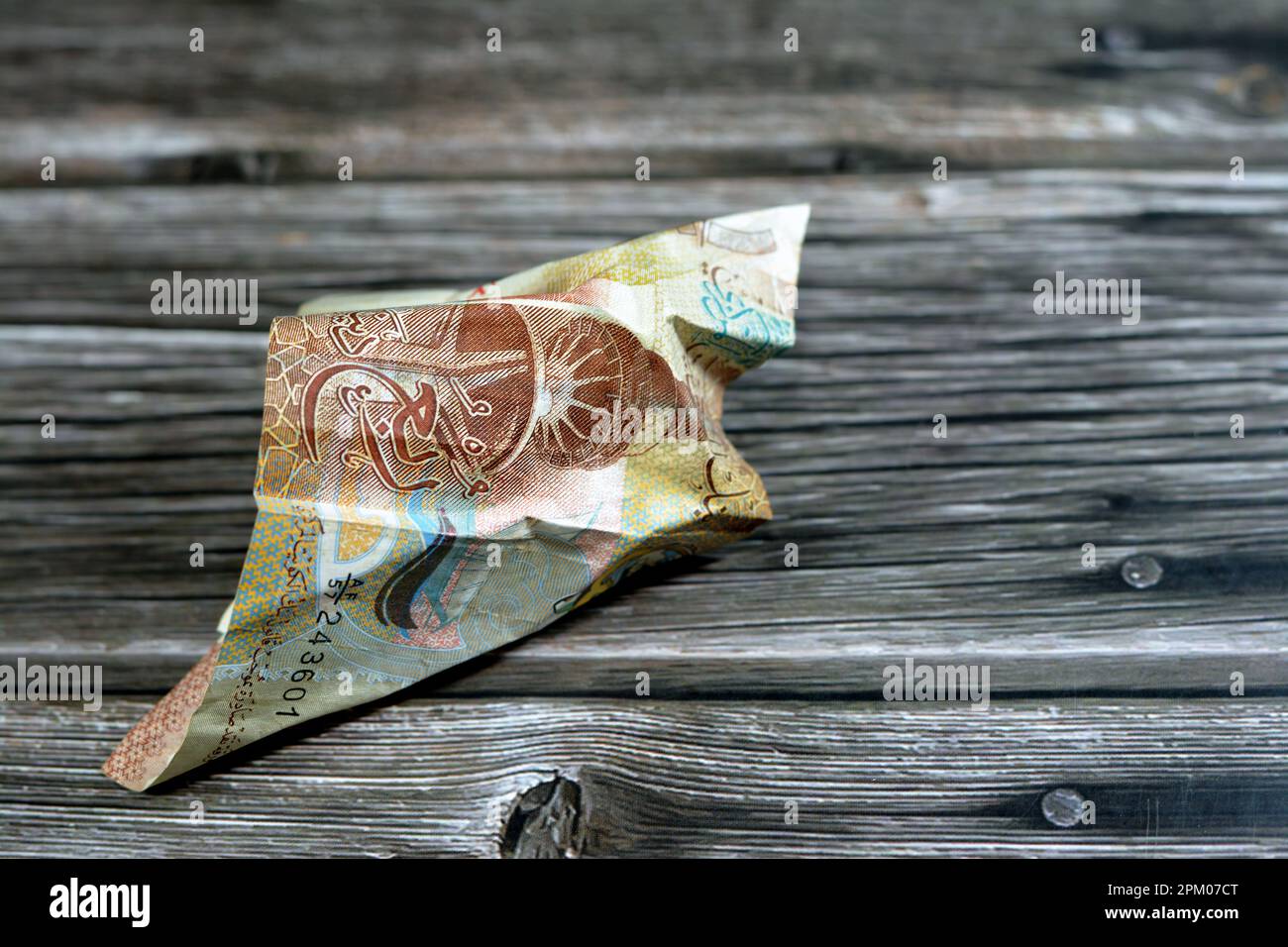 Crumpled Kuwaiti money of change KWD quarter Kuwait dinar bill banknote ...