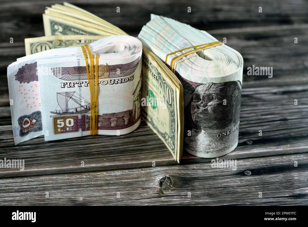 Folded stack Egypt money banknote bills of 100 and 50 EGP LE one ... Folded stack Egypt money banknote bills of 100 and 50 EGP LE one ...