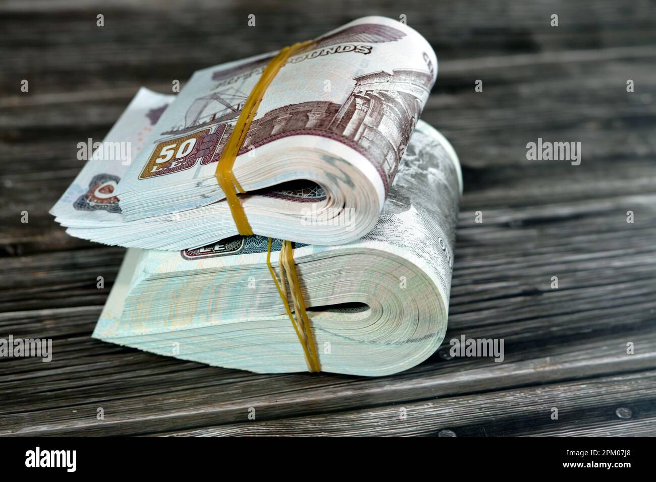 Egypt money folded bundles banknote bills of 100 and 50 EGP LE one ...