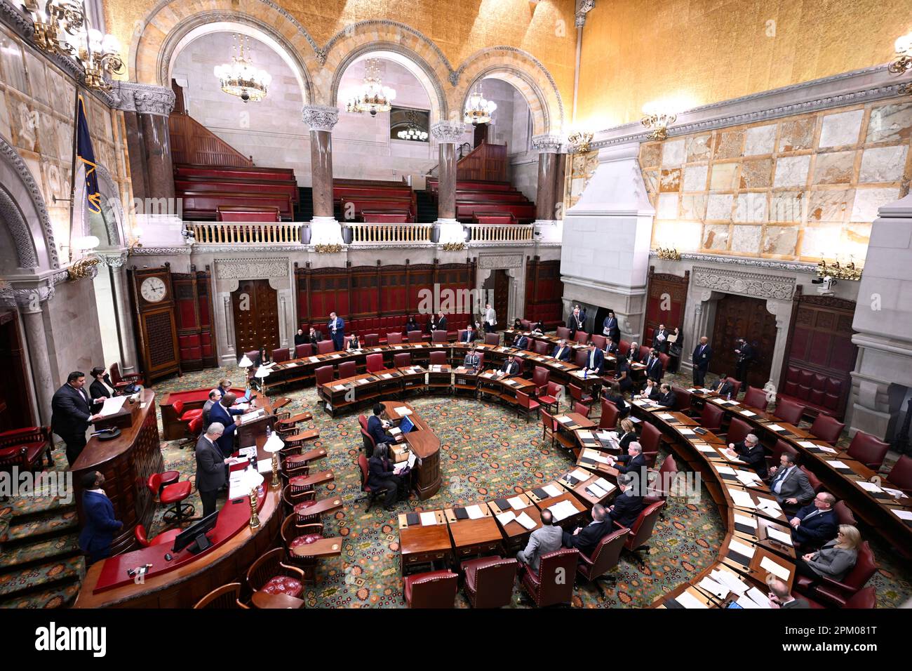 FILE - Members of the New York Senate work on legislative bills in the ...
