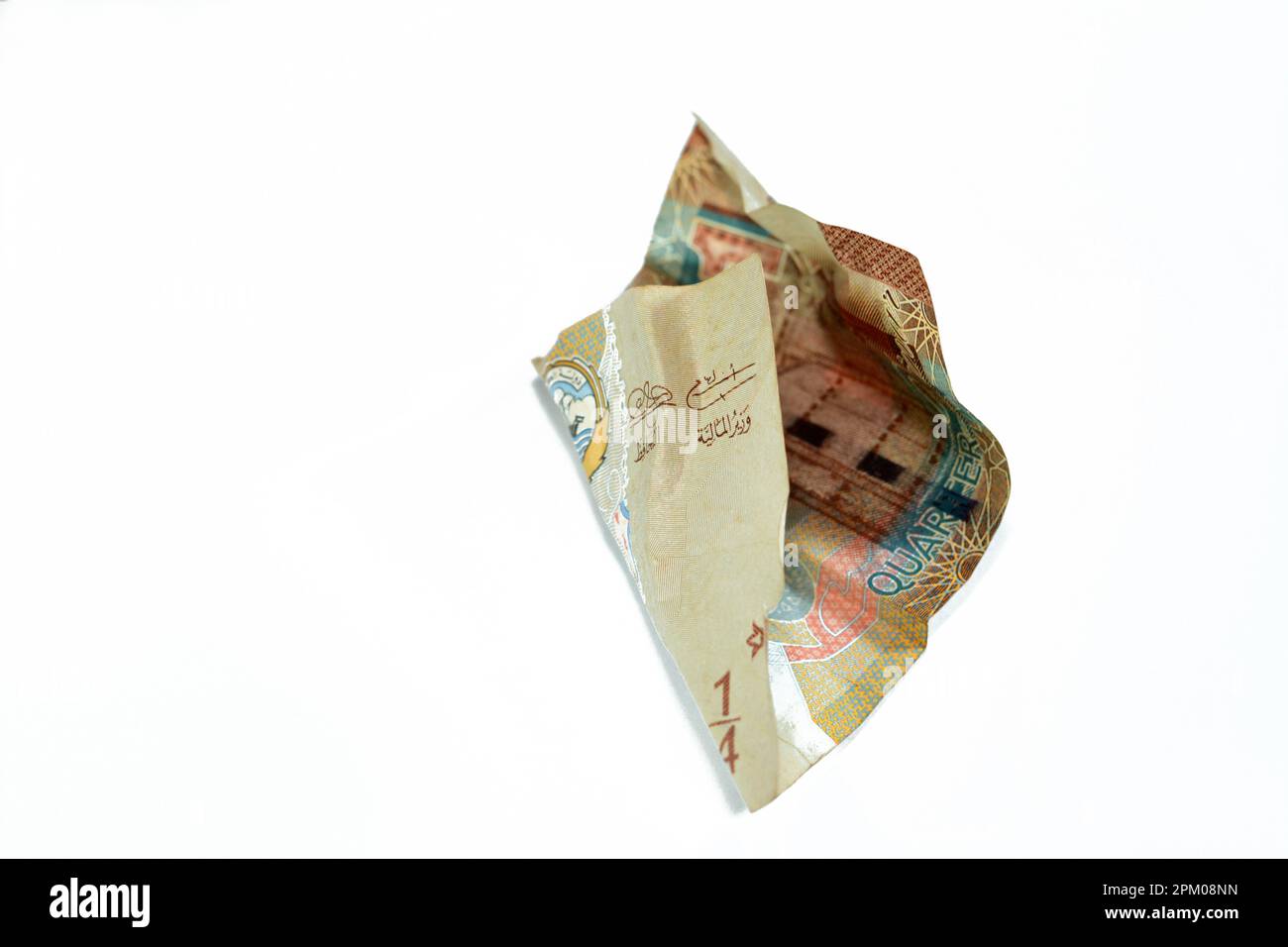 Crumpled Kuwaiti money of change KWD quarter Kuwait dinar bill banknote ...