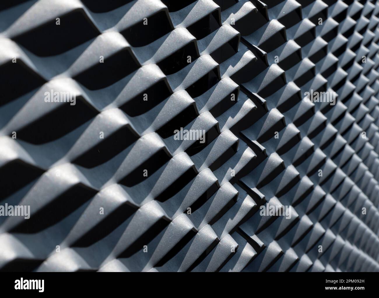 embossed triangular metal fence texture Stock Photo - Alamy