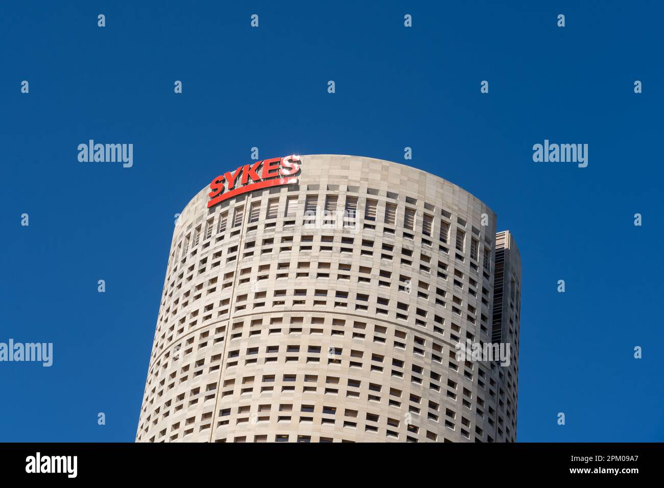 SYKES logo on its headquarters building in Tampa, FL, USA Stock Photo ...