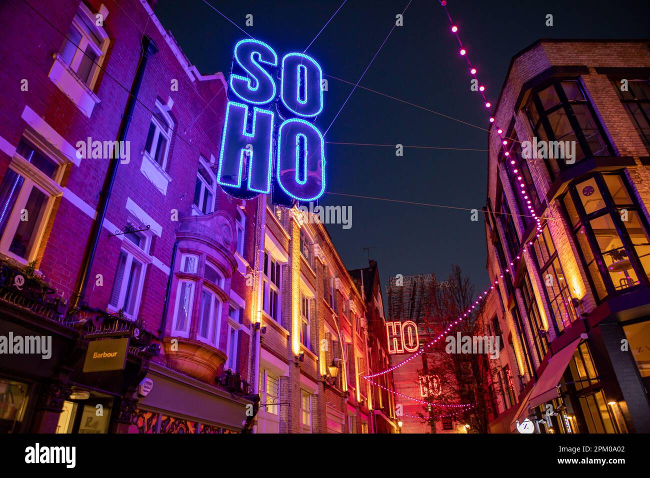 London, England – December 2022. The energetic streets of Soho, in ...