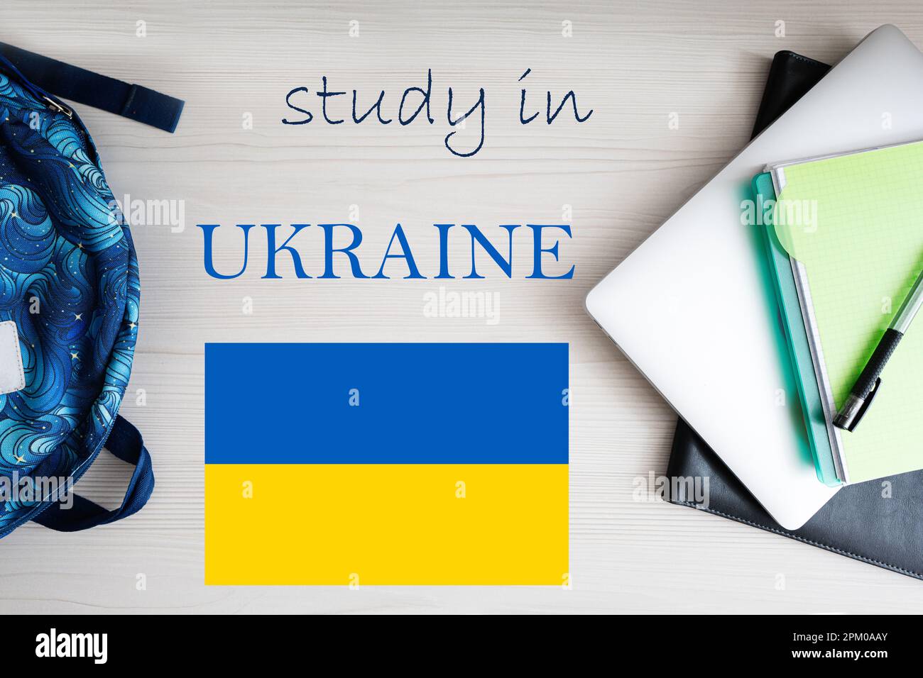 Study in Ukraine. Background with notepad, laptop and backpack ...