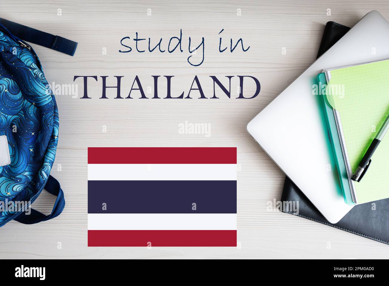 Study in Thailand. Background with notepad, laptop and backpack ...