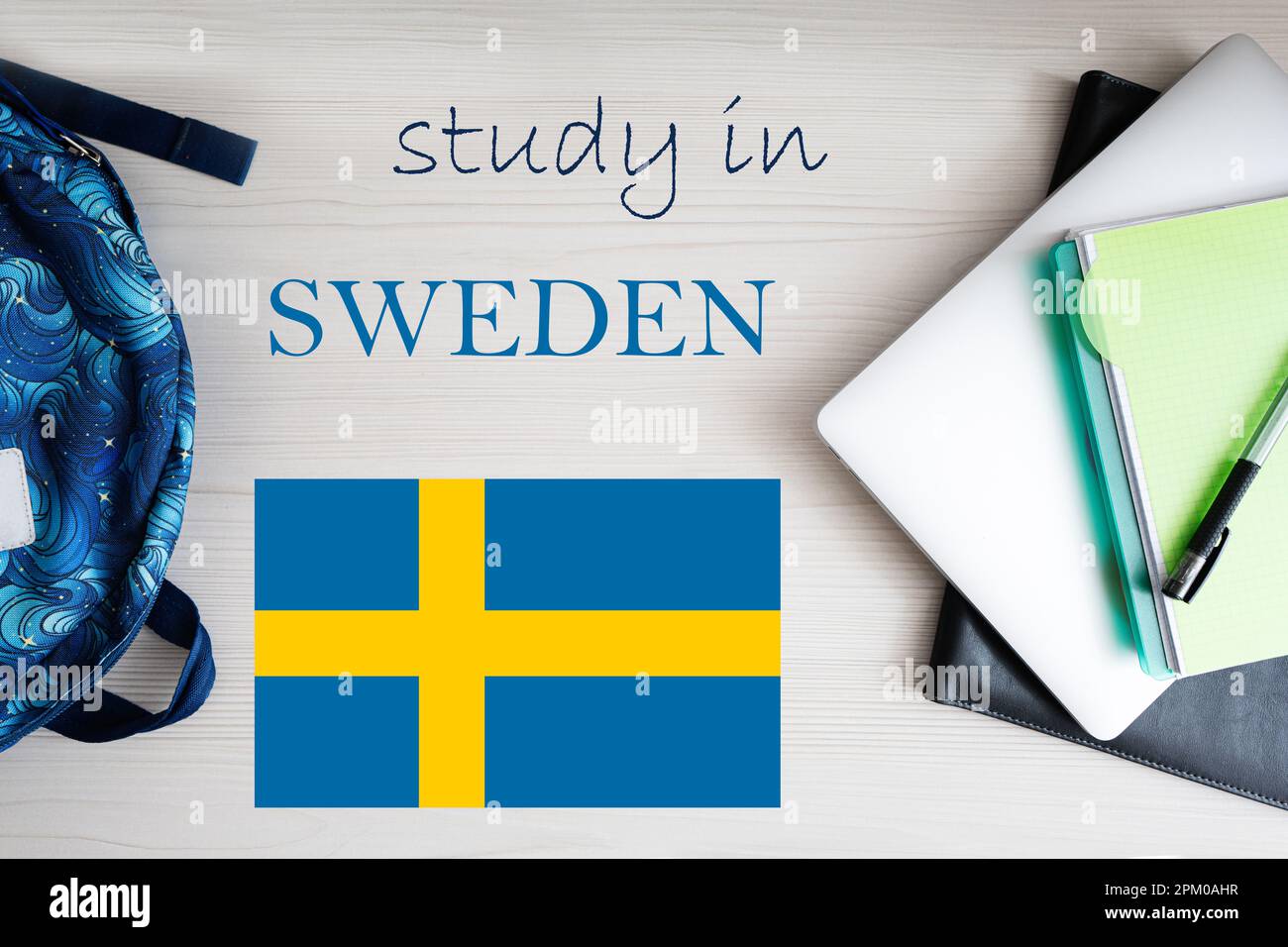 Study in Sweden. Background with notepad, laptop and backpack ...