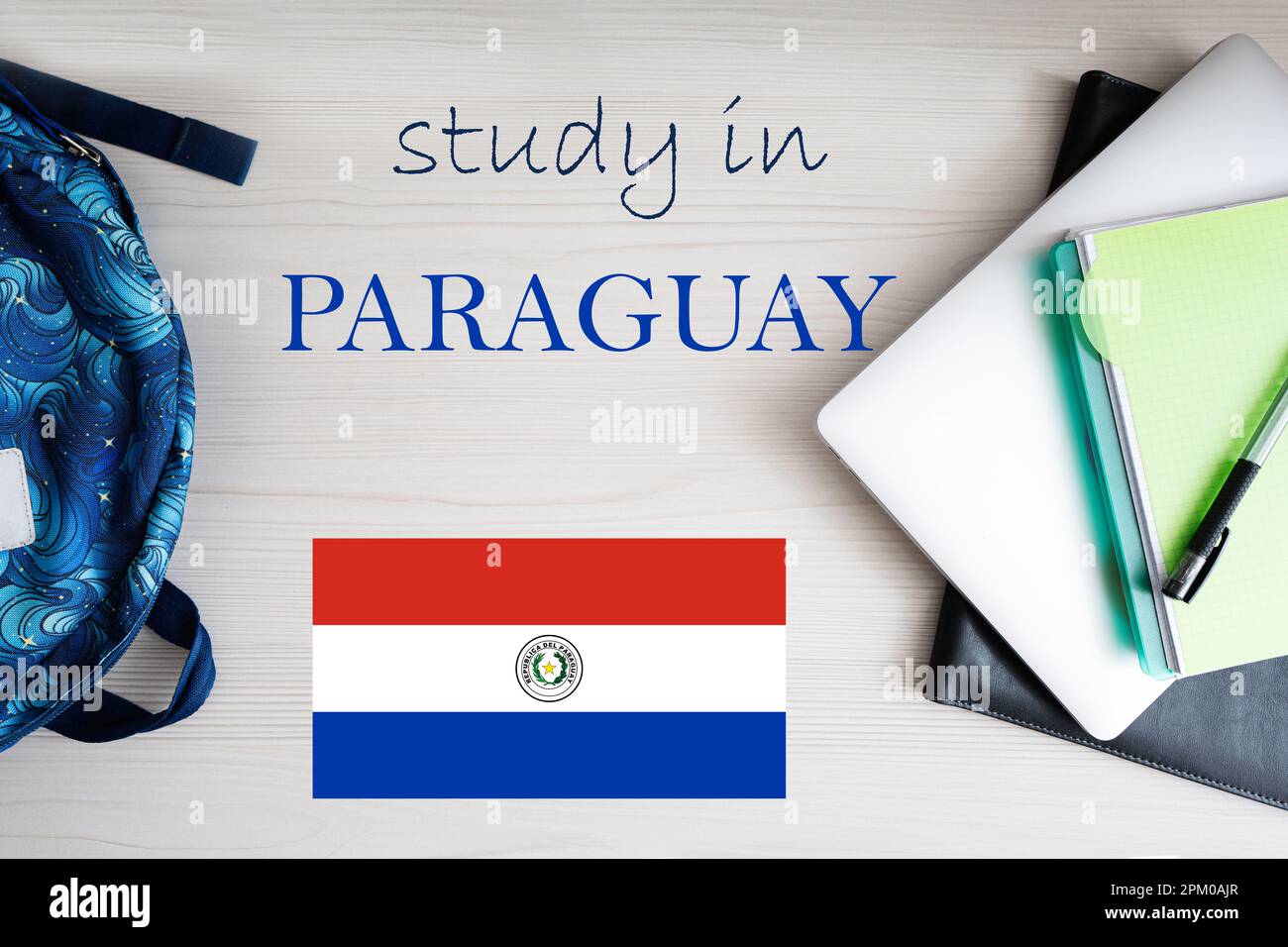 Study in Paraguay. Background with notepad, laptop and backpack ...