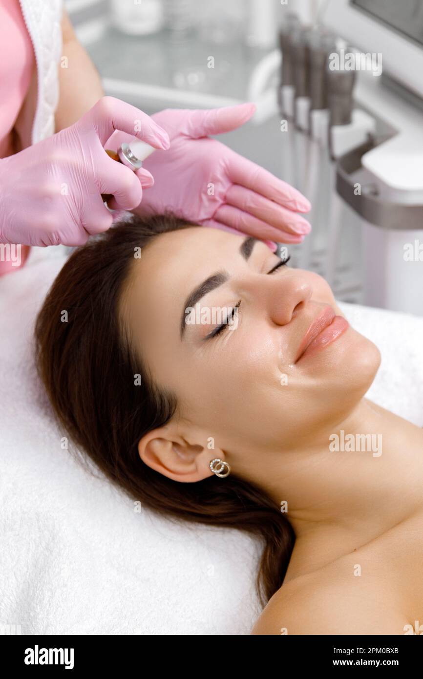 Facial treatment, cosmetic facial procedure, Cosmetology service Stock ...