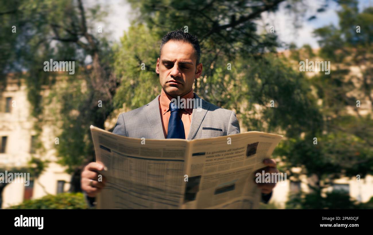 Business Man With Newspaper Stock Photo - Alamy