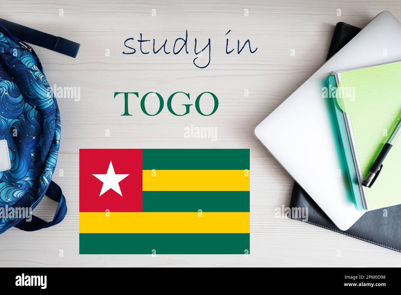 Study in Togo. Background with notepad, laptop and backpack. Education ...