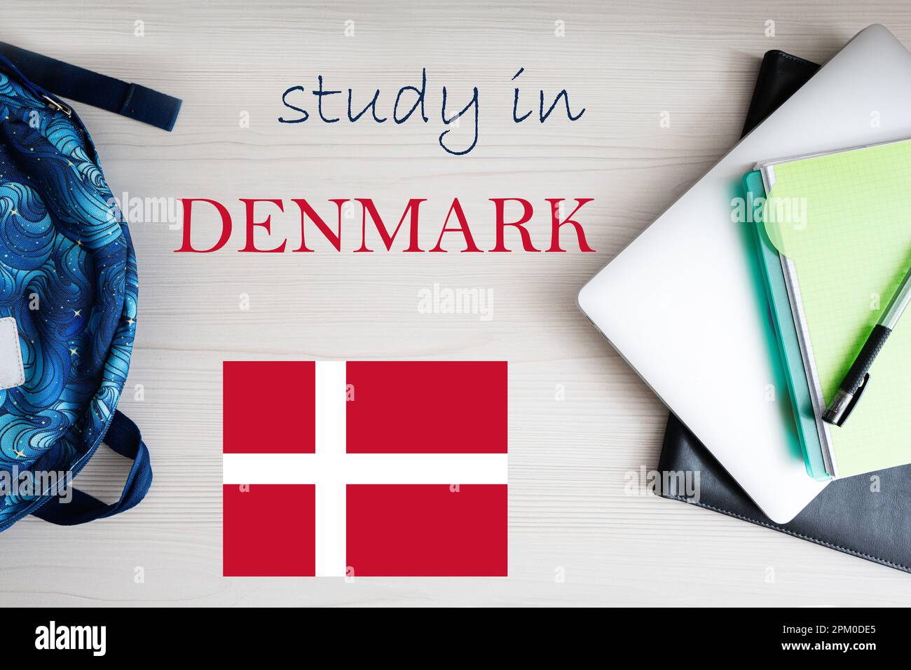 Study in Denmark. Background with notepad, laptop and backpack ...