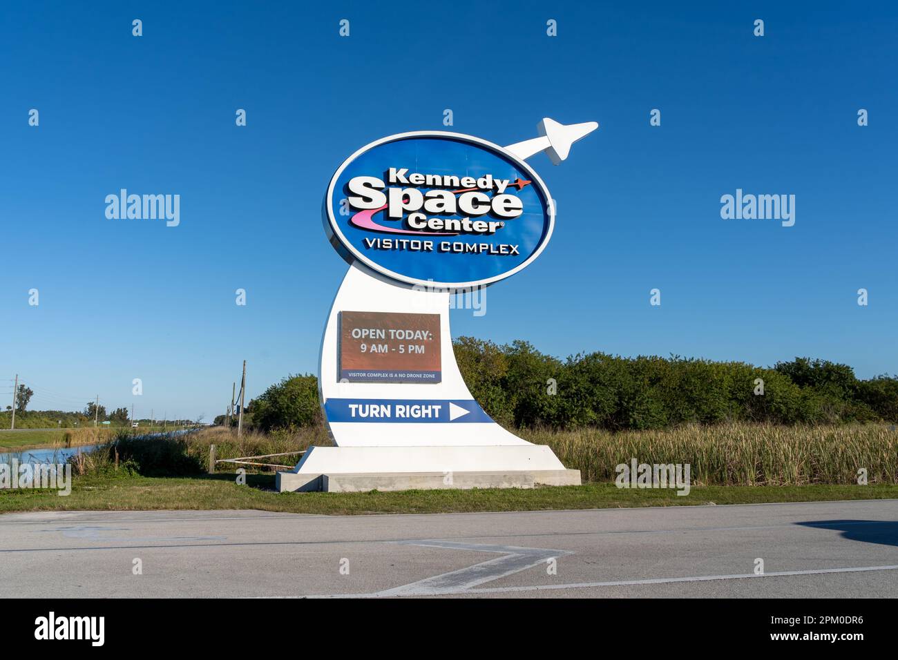 Kennedy Space Center Visitor Complex sign is shown in Merritt Island ...