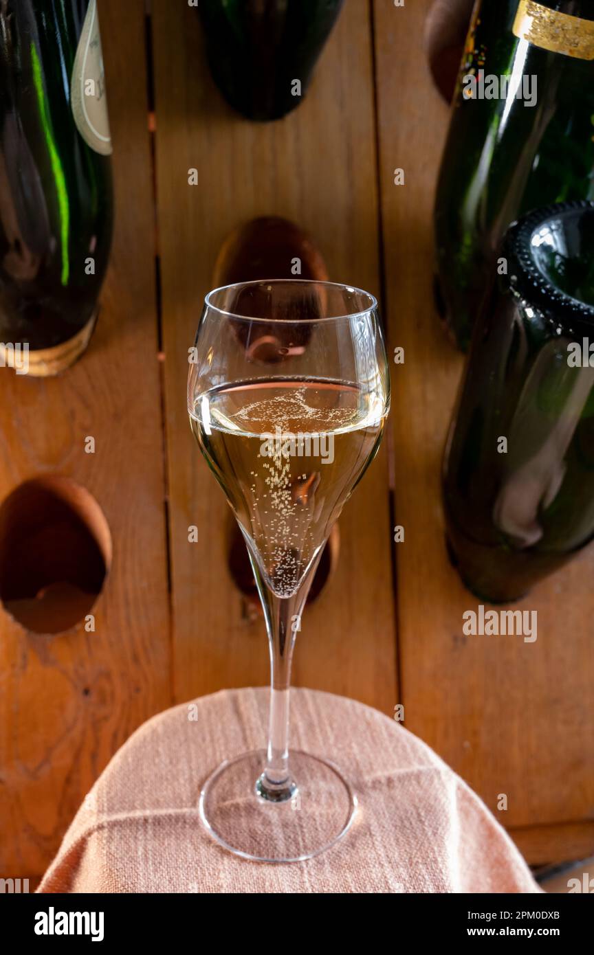 Glasses of sparkling white wine champagne gran cru or cava with bubbles ...