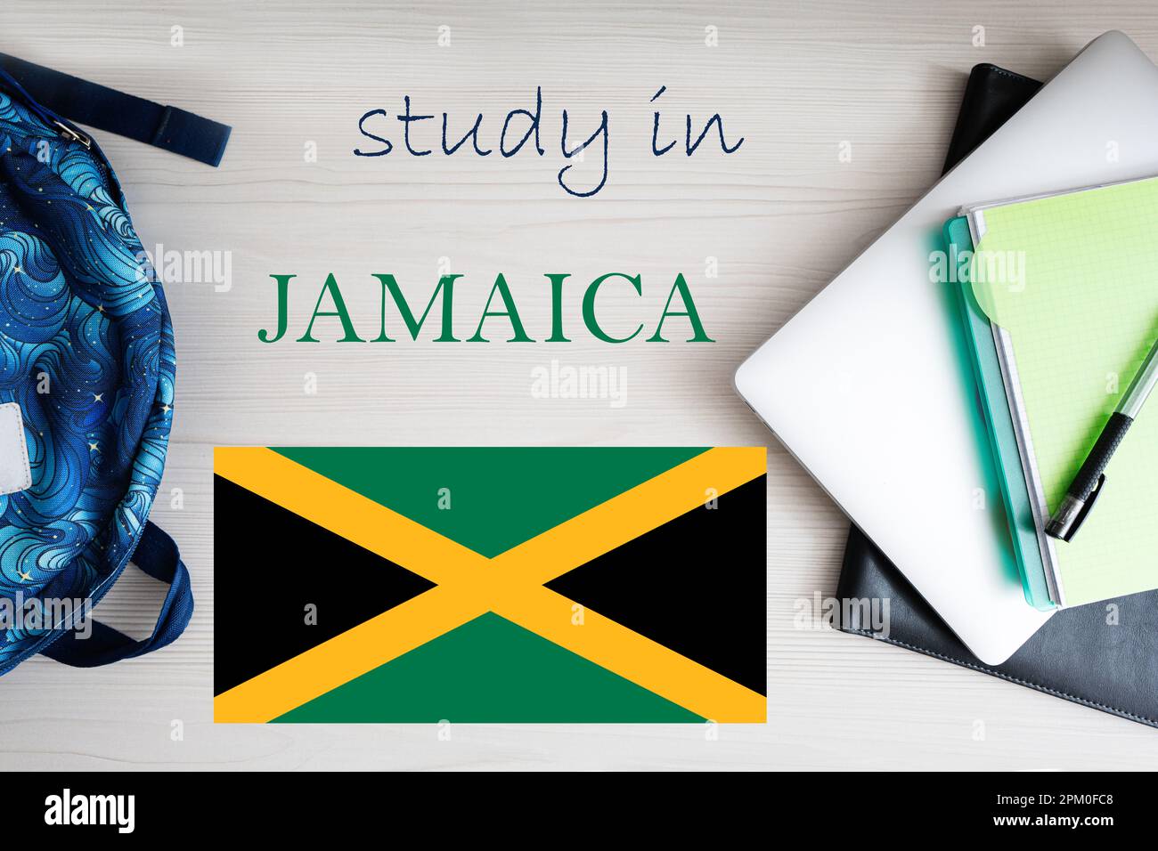Study in Jamaica. Background with notepad, laptop and backpack ...