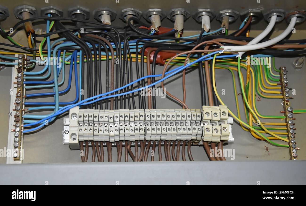 Different colored wires on electric board Stock Photo - Alamy