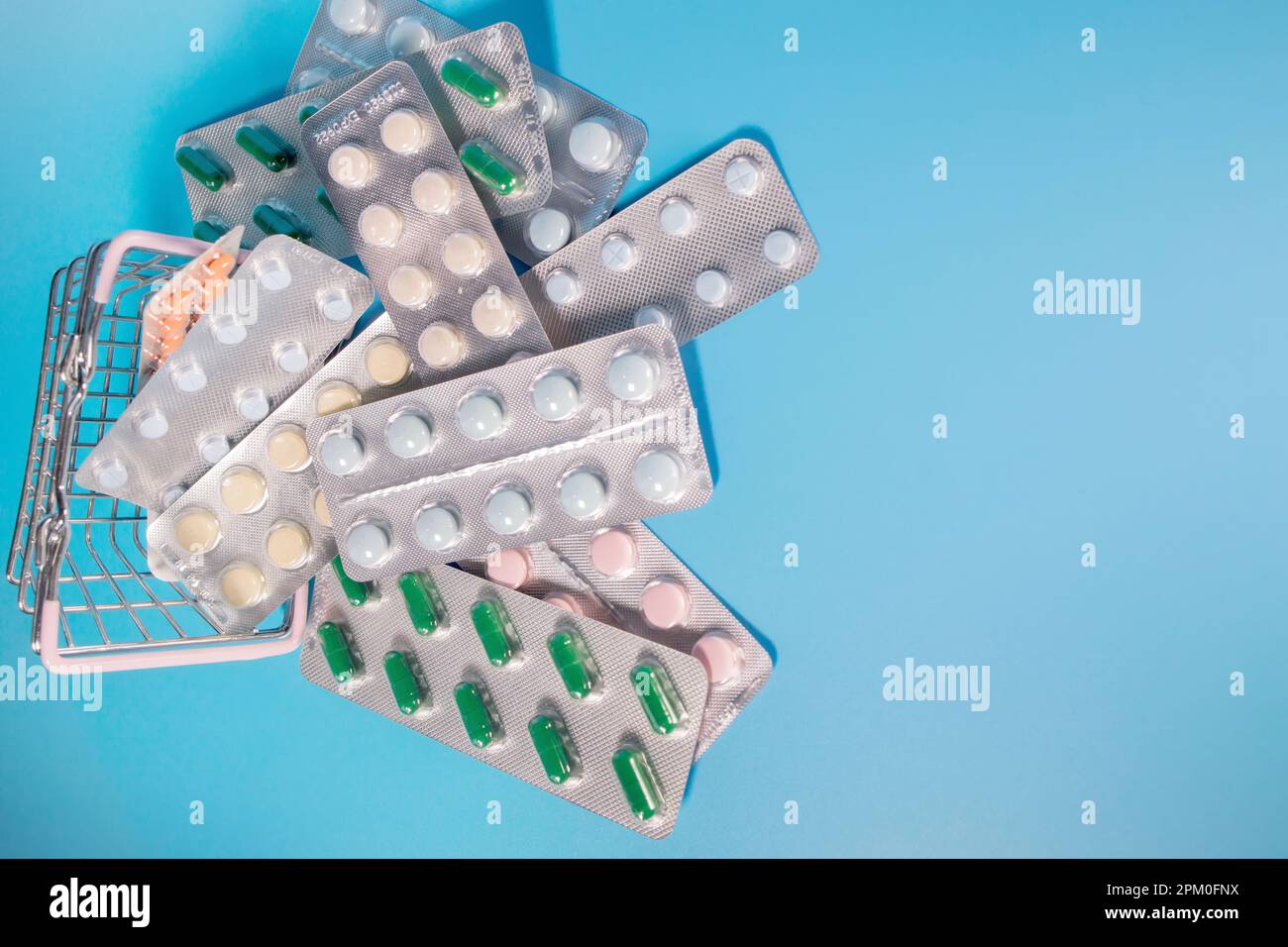 A bunch of pills in a blister pack. Blisters with colorful pills ...