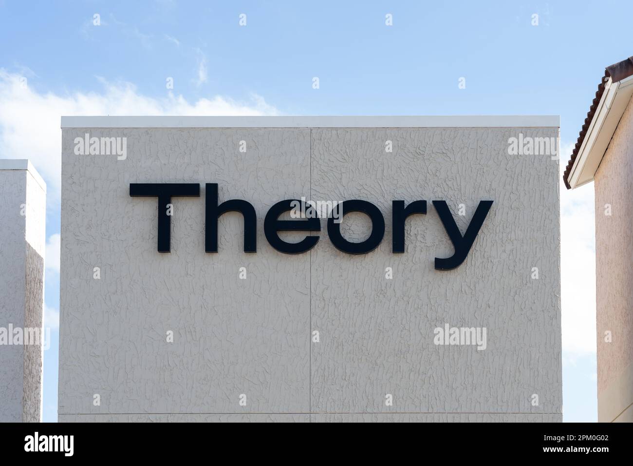 The Theory store sign on the building at a shopping mall is shown Stock Photo - Alamy