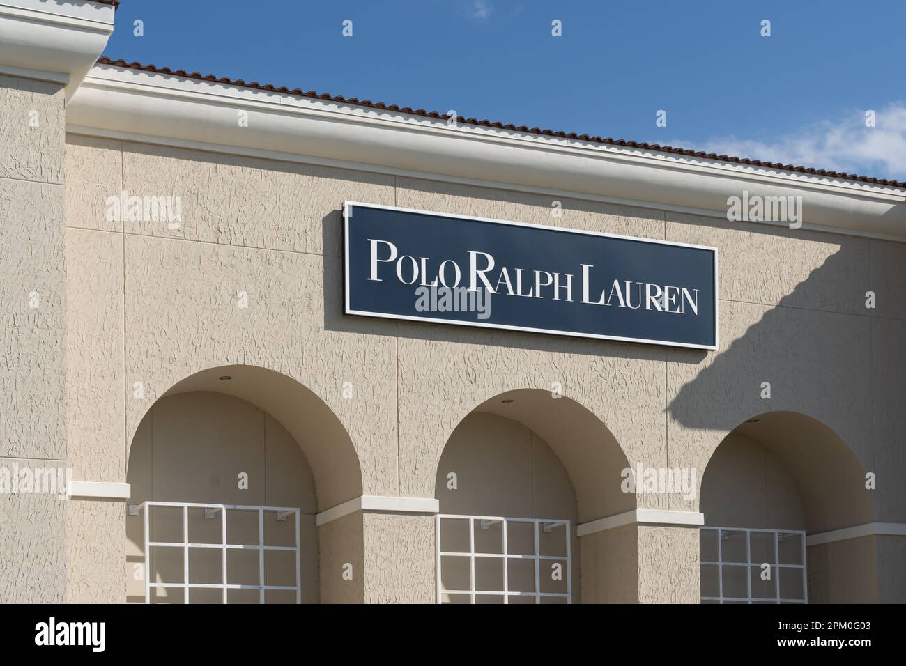 The Polo Ralph Lauren store sign on the building at a shopping mall is ...