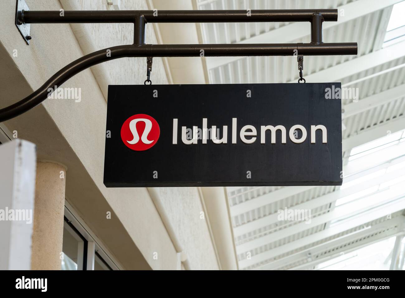 Close up of lululemon store hanging sign is shown Stock Photo - Alamy