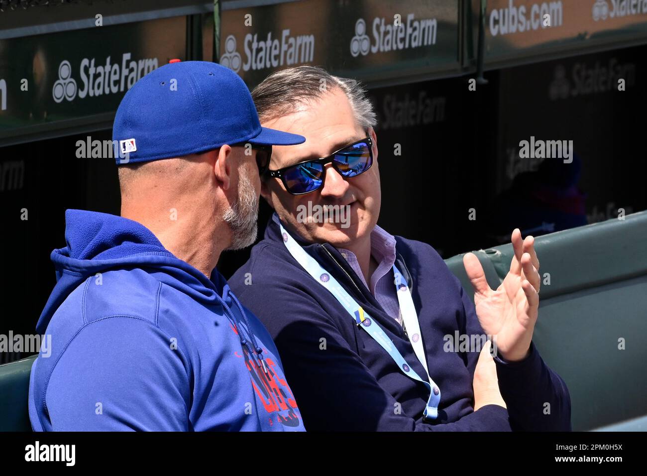 Chicago Cubs manager David Ross, left, talks with team Chairman Tom ...