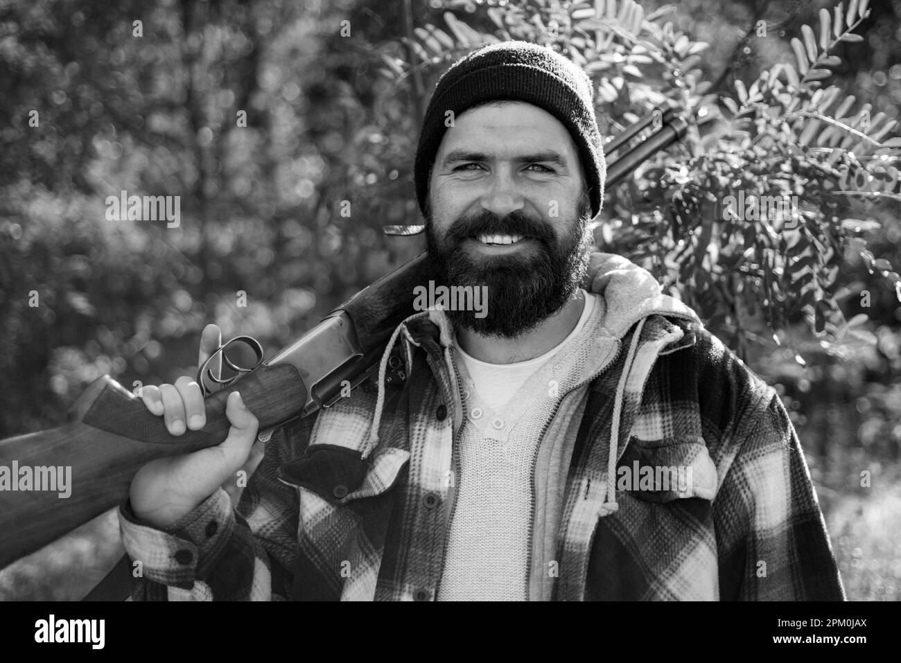 Hunter with shotgun gun on hunt. Beard and Wax. Barbershop vintage ...