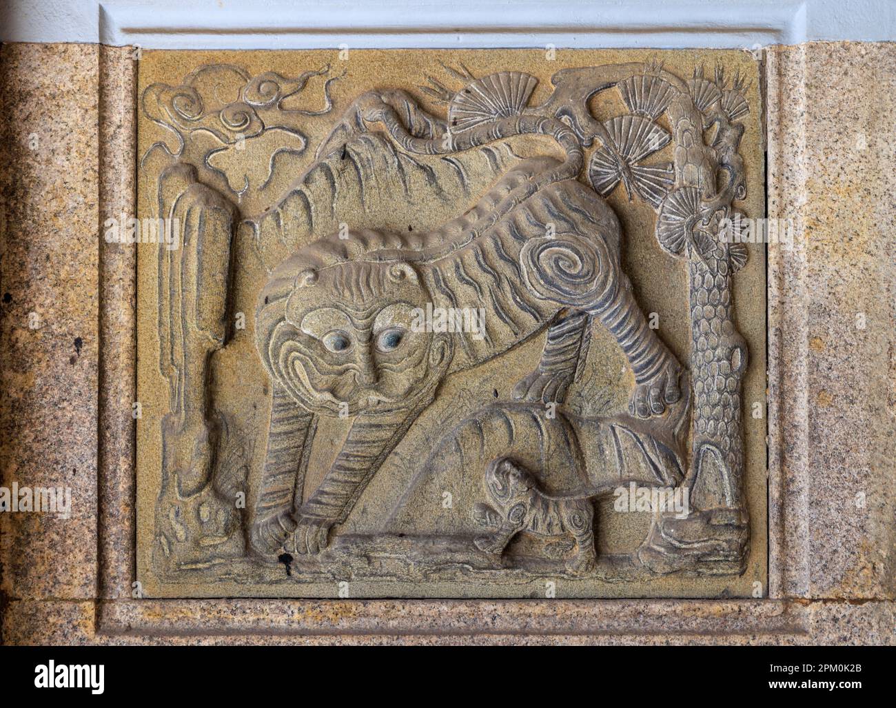 Stone tiger carving at Thian Hock Keng Temple, Singapore Stock Photo ...
