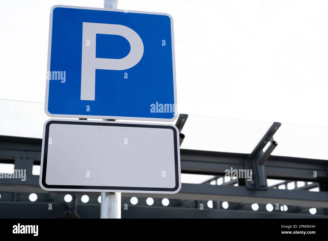 Blue car parking sign with copy space for text Stock Photo - Alamy