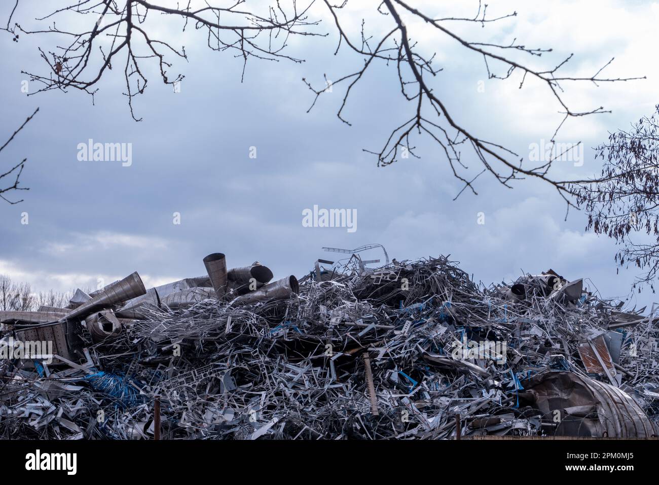 Scrap metal dump in the open air. The concept of environmental safety ...
