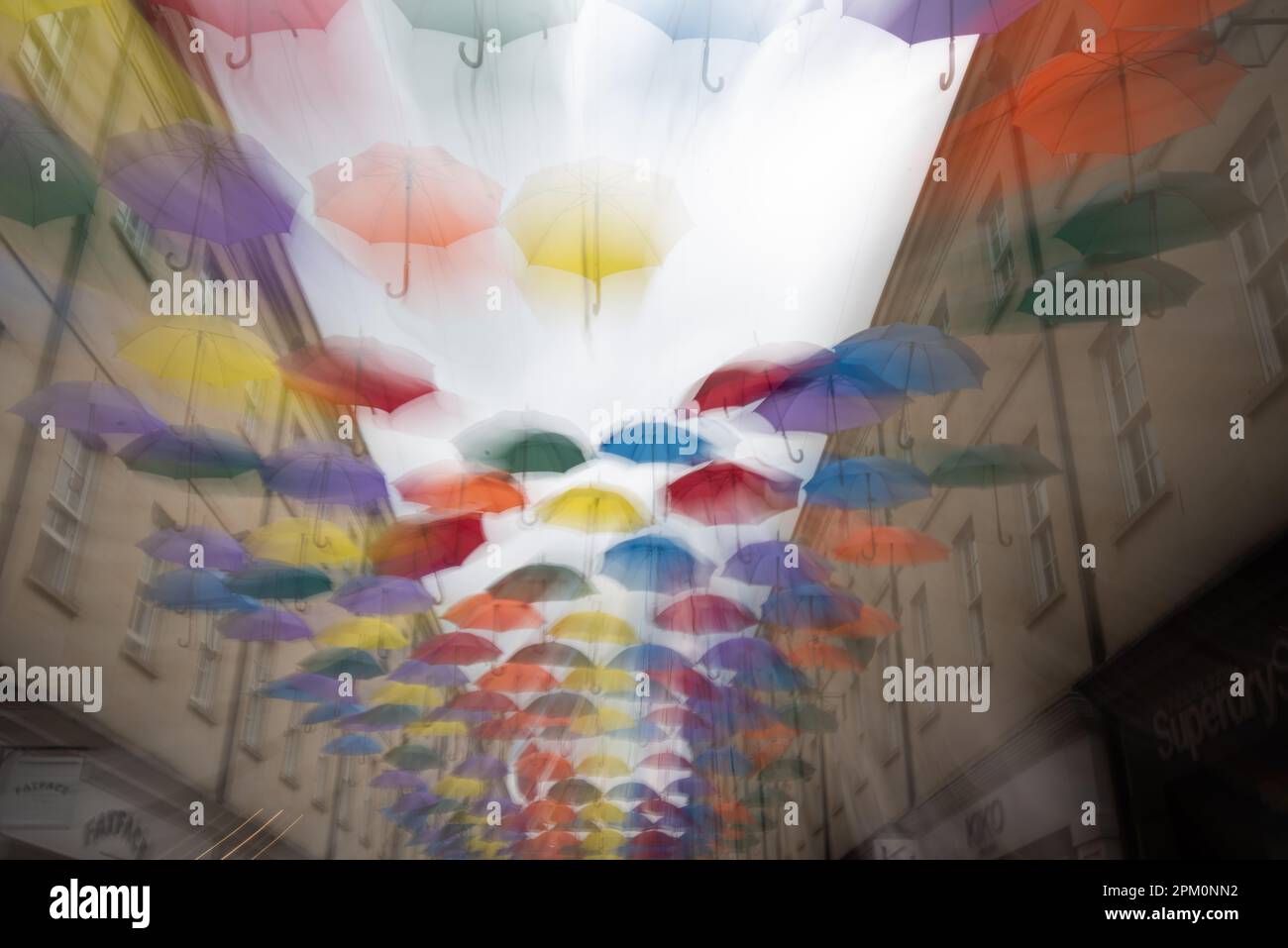Long exposure zooming in on umbrellas installation in bath Stock Photo ...