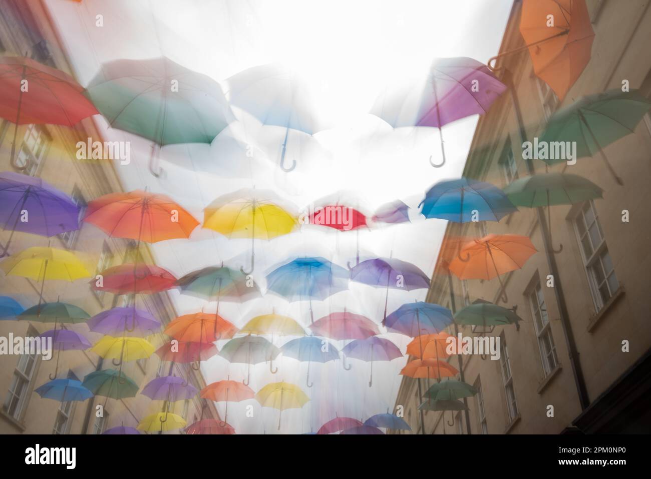Long exposure zooming in on umbrellas installation in bath Stock Photo ...