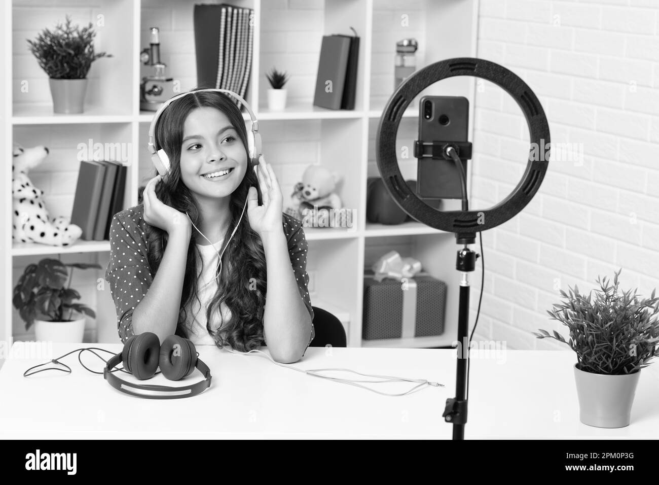 Teenager recording online media video. Teen girl streaming online and ...