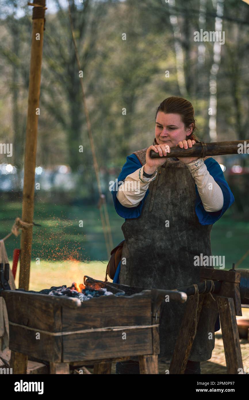 Kaiserslautern, Germany. 10th Apr, 2023. A female blacksmith assistant ...