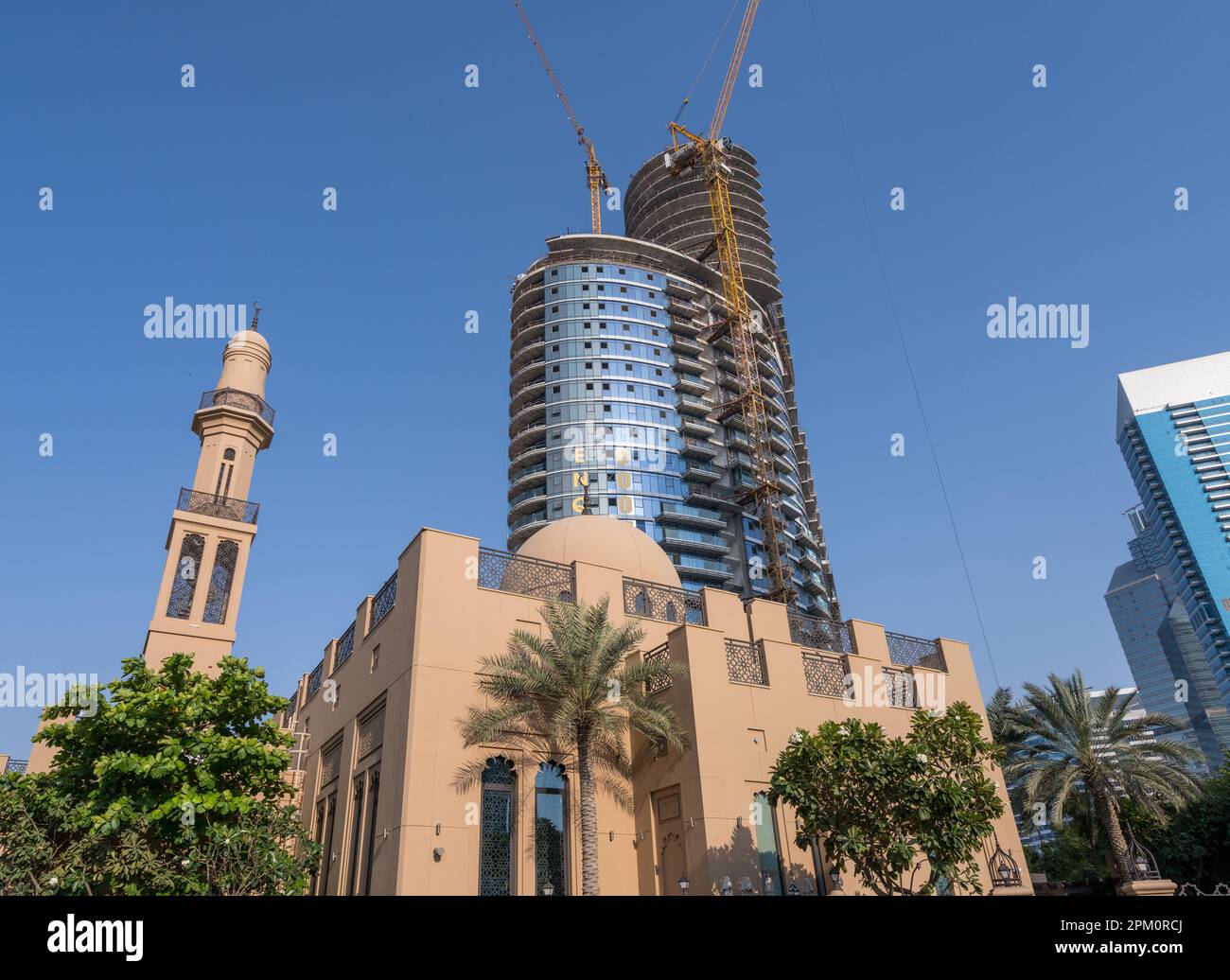 Construction of new tower for apartments or offices behind a mosque in ...