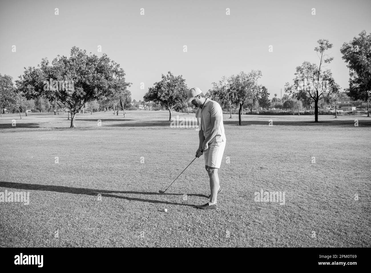 portrait of golfer in cap with golf club. people lifestyle. man playing ...